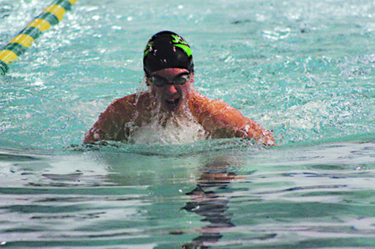 Swimmers show some splash at pre-district warm-up - The New Era