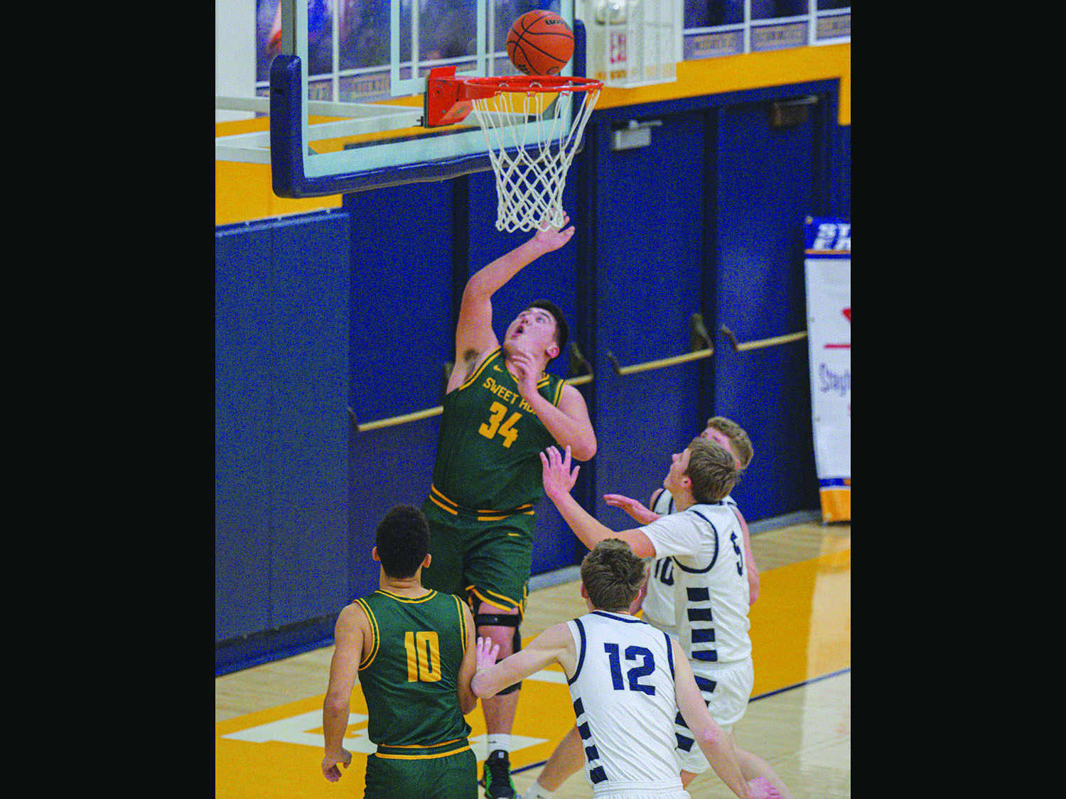 Husky boys open league play with tough losses - The New Era