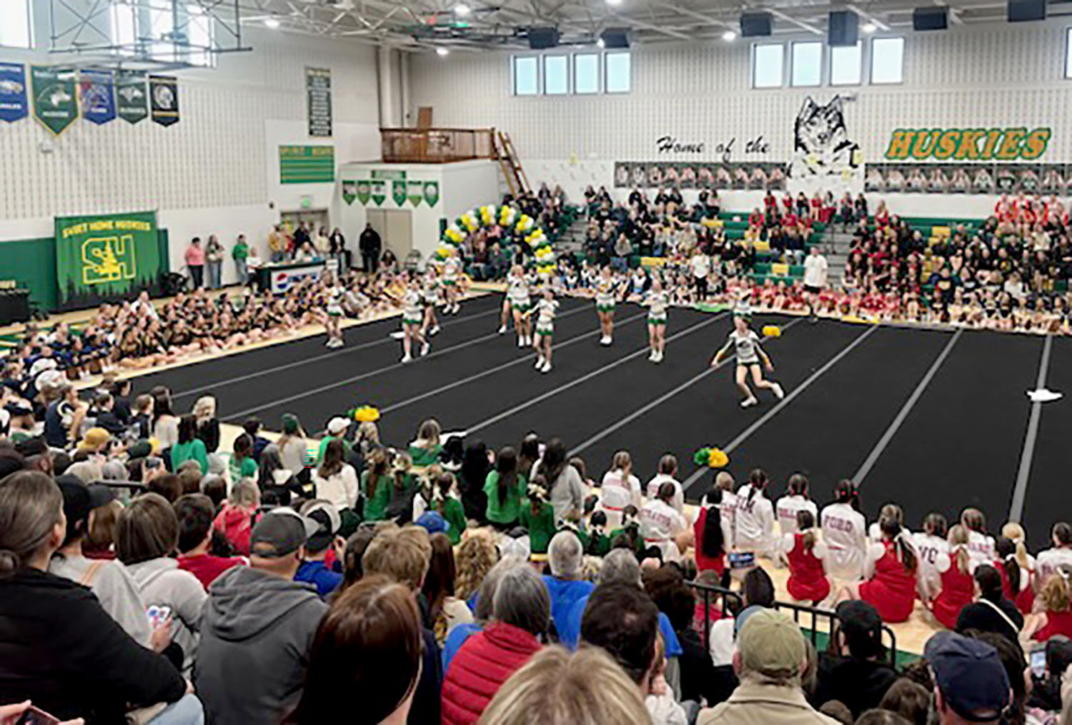 Top cheer teams perform in Sweet Home - The New Era