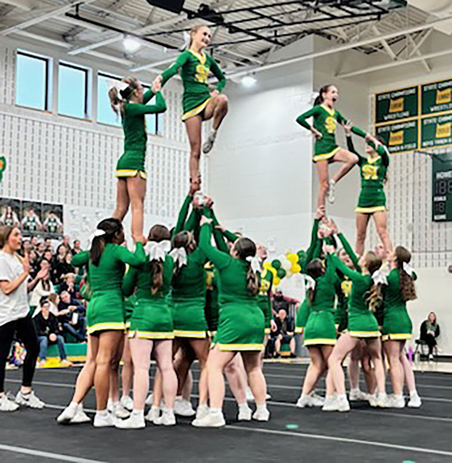 Top cheer teams perform in Sweet Home - The New Era